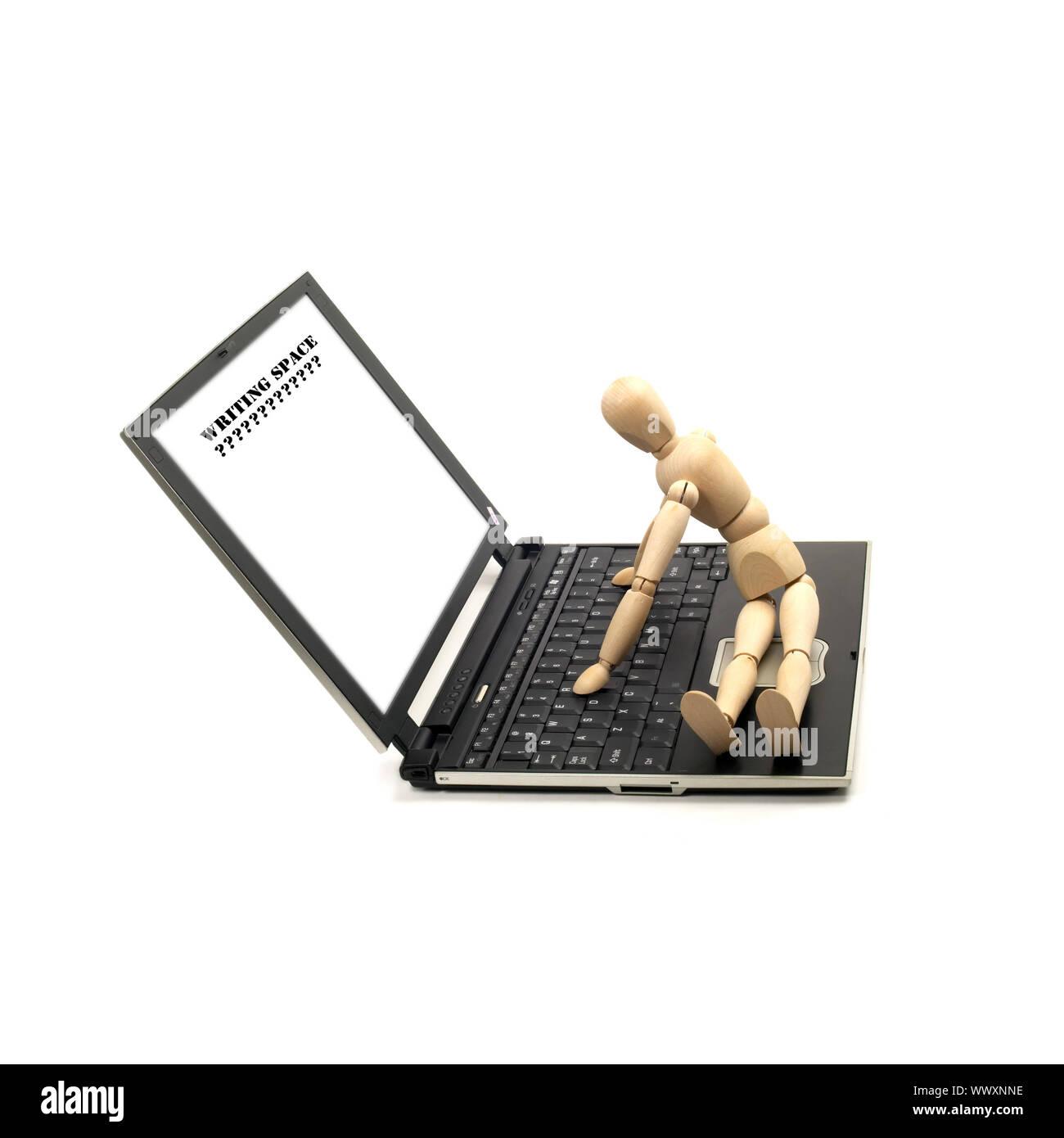 wood mannequin sitting on a laptop isolated on white background Stock ...