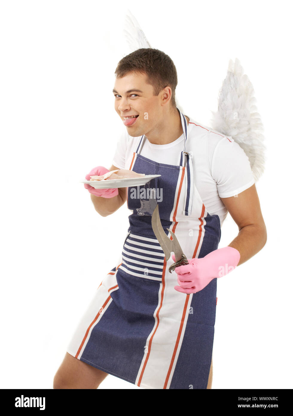 crazy cook with fish on plate and angel wings Stock Photo - Alamy