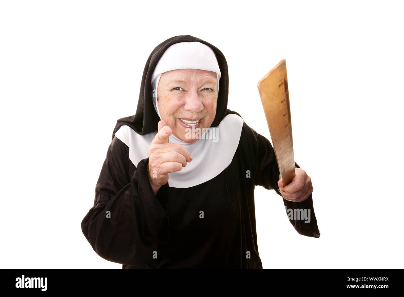 Funny nun carrying wooden ruler as a weapon Stock Photo - Alamy