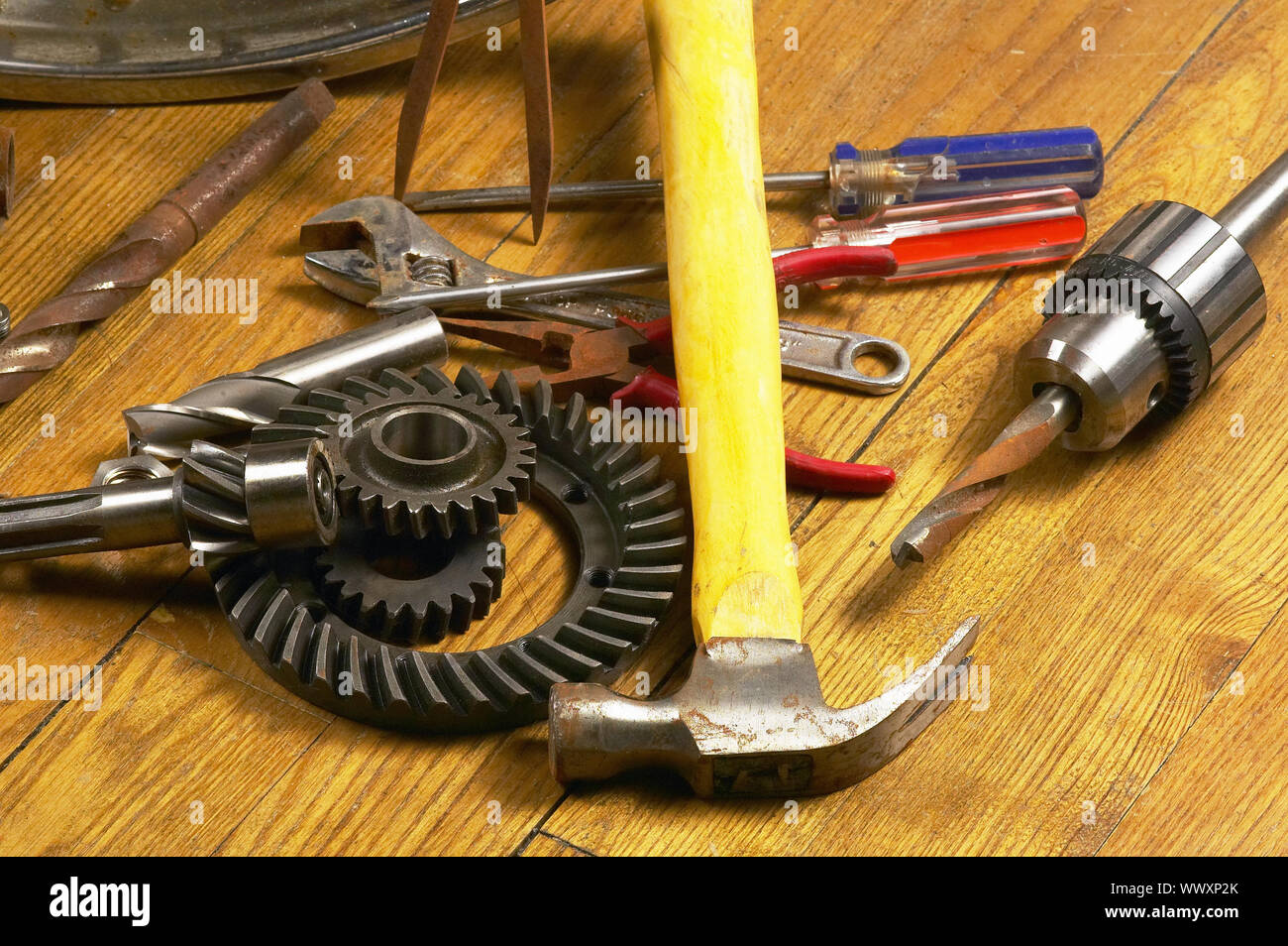 bounch of rusty tools and gears on the wood floor Stock Photo - Alamy