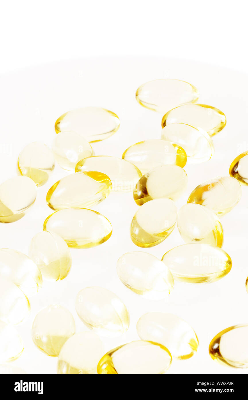 bounch of gel translucent pills on white background Stock Photo - Alamy