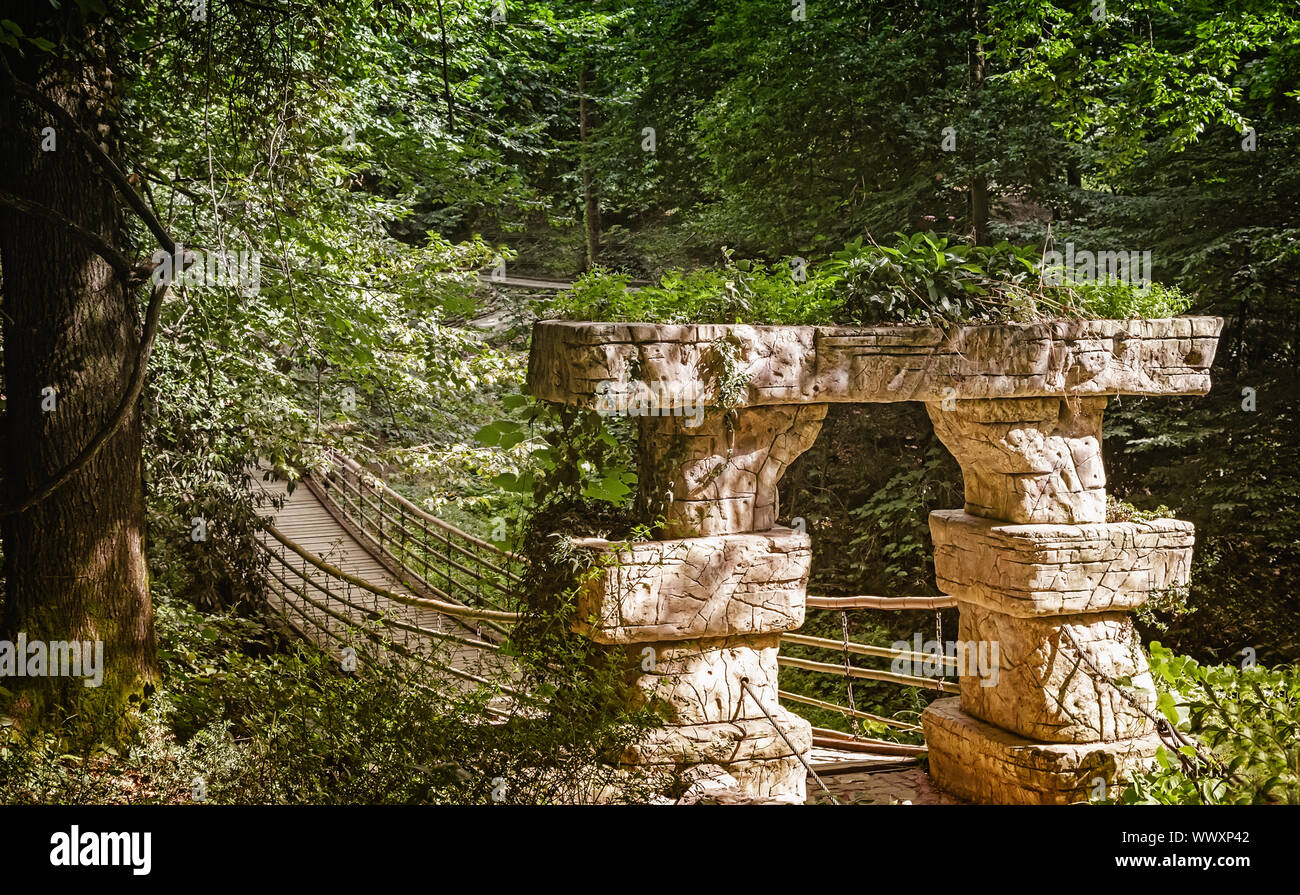 Small suspension bridge in the arboretum Stock Photo - Alamy