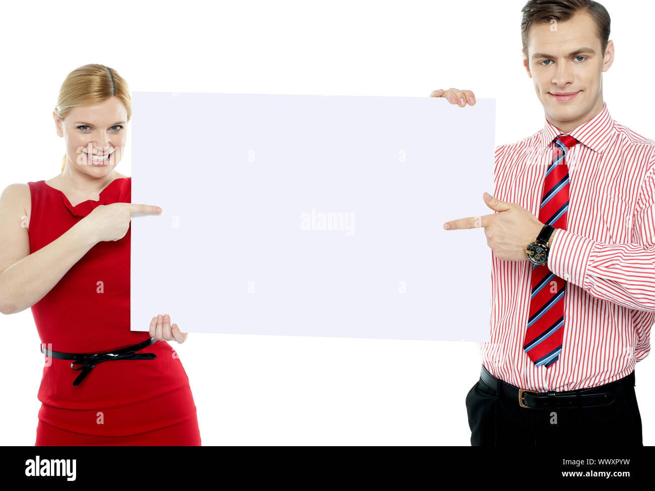 Business colleagues pointing at blank signboard isolated against white ...