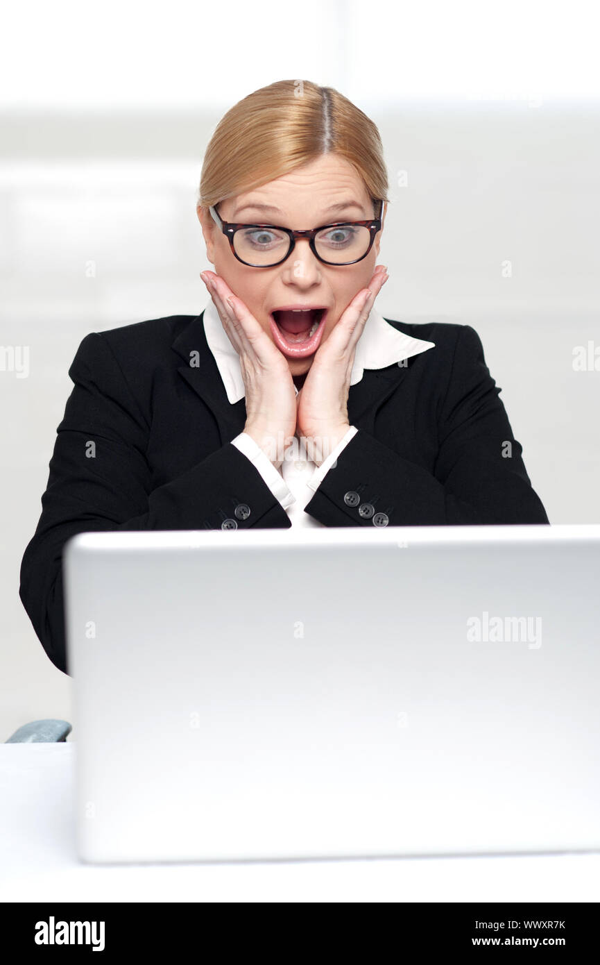 Surprised shocked secretary laptop hi-res stock photography and images ...