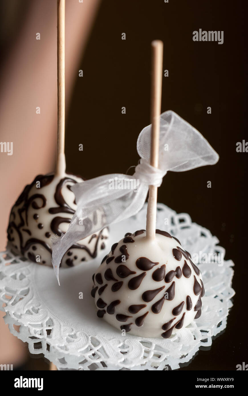 Luxury handmade white chocolate candy with stick Stock Photo - Alamy