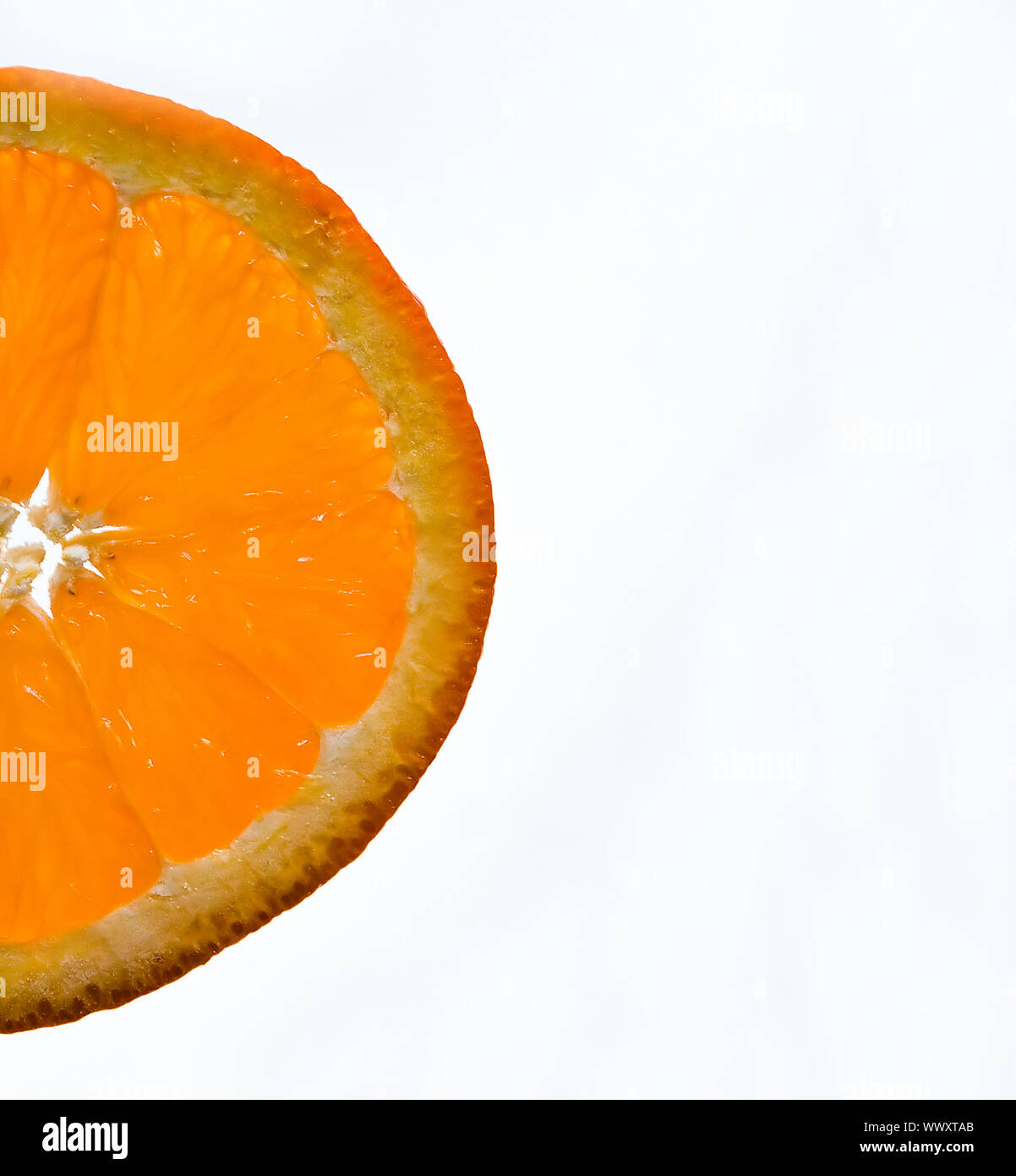 a half wedge of orange or mandarine isolated on white Stock Photo - Alamy