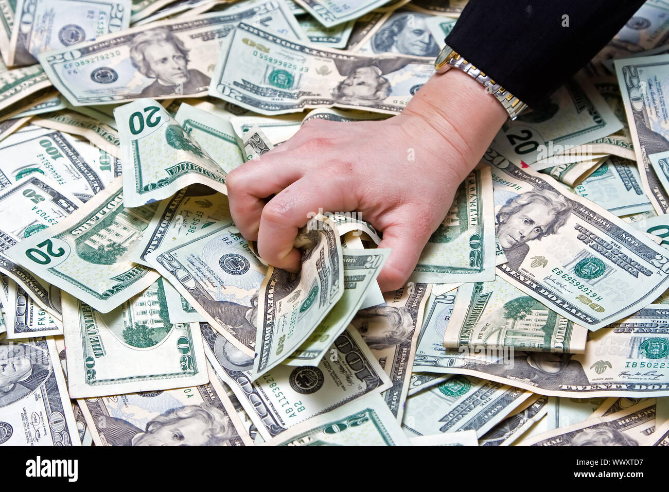 Female hand grabbing pile hi-res stock photography and images - Alamy