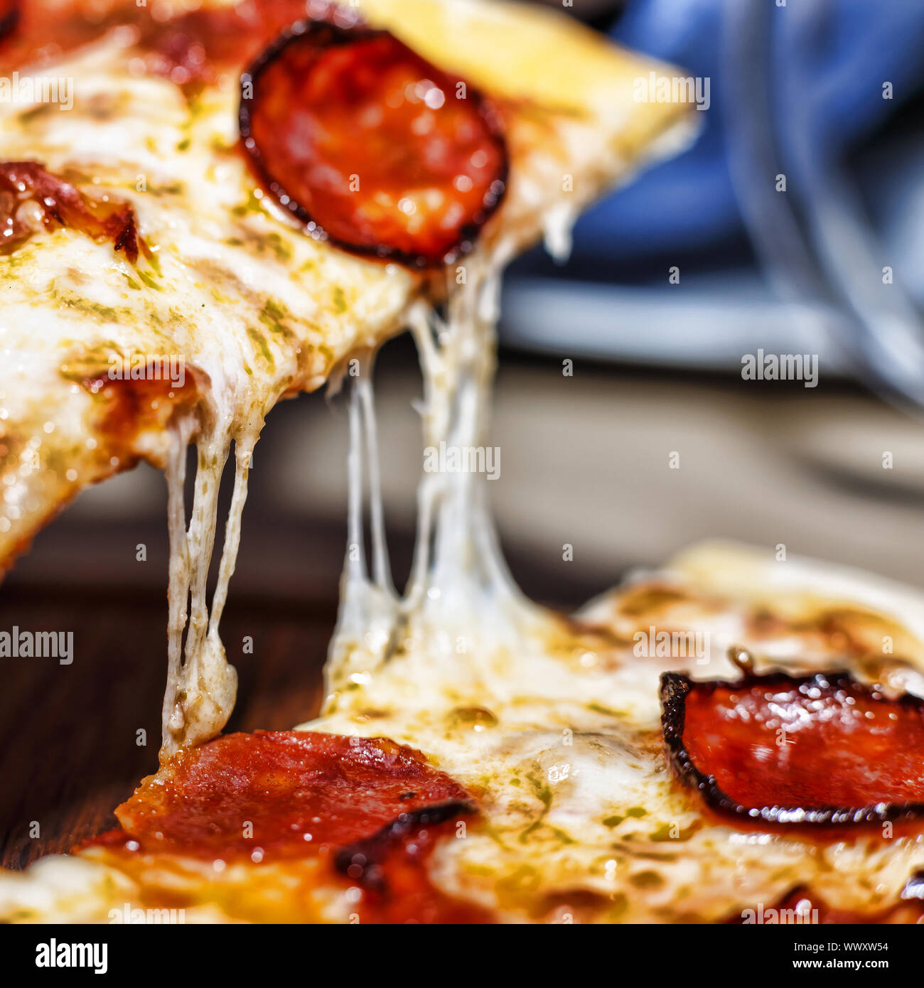 Closeup of a piece of pepperoni pizza. Italian pizza Stock Photo - Alamy