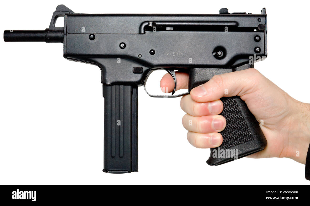 Man's hand holding the big automatic pistol Stock Photo - Alamy