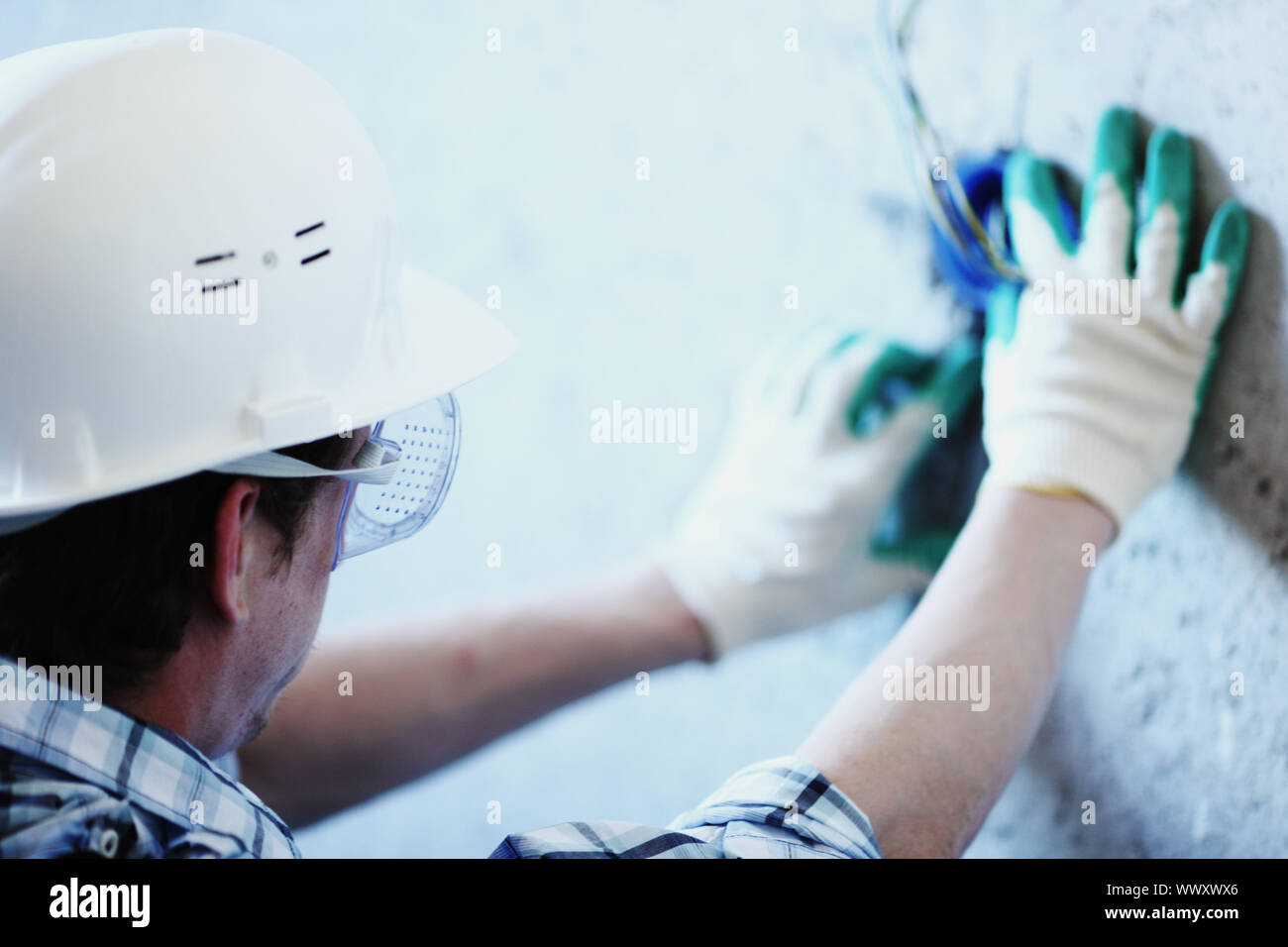 worker puts the wires Stock Photo - Alamy