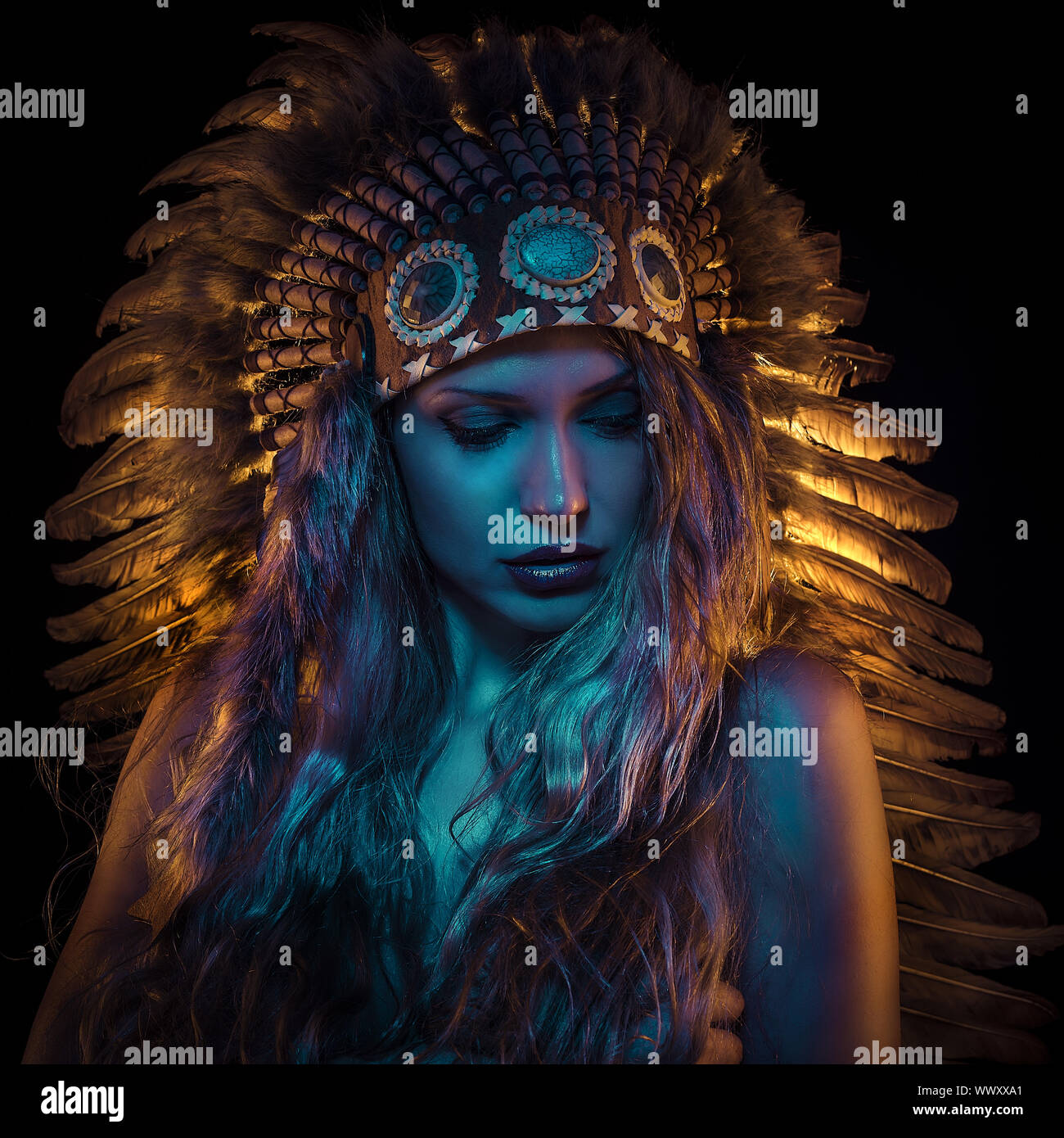 Colorful, beautiful girl with plume of american indian feathers Stock ...