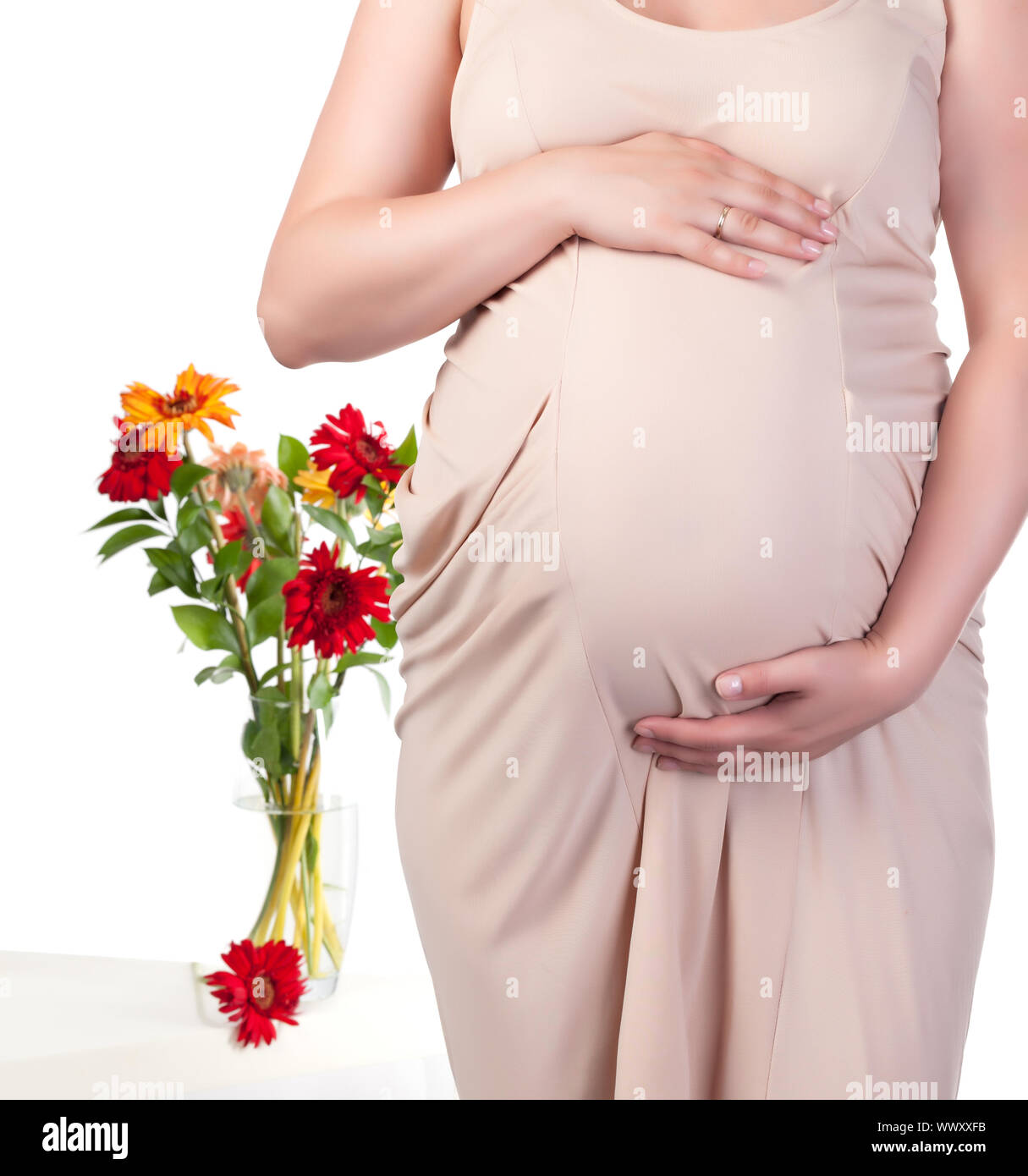 Pregnant Woman with Flowers Stock Photo - Alamy