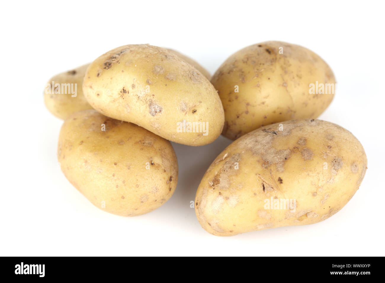 potato pile isolated on white background Stock Photo - Alamy
