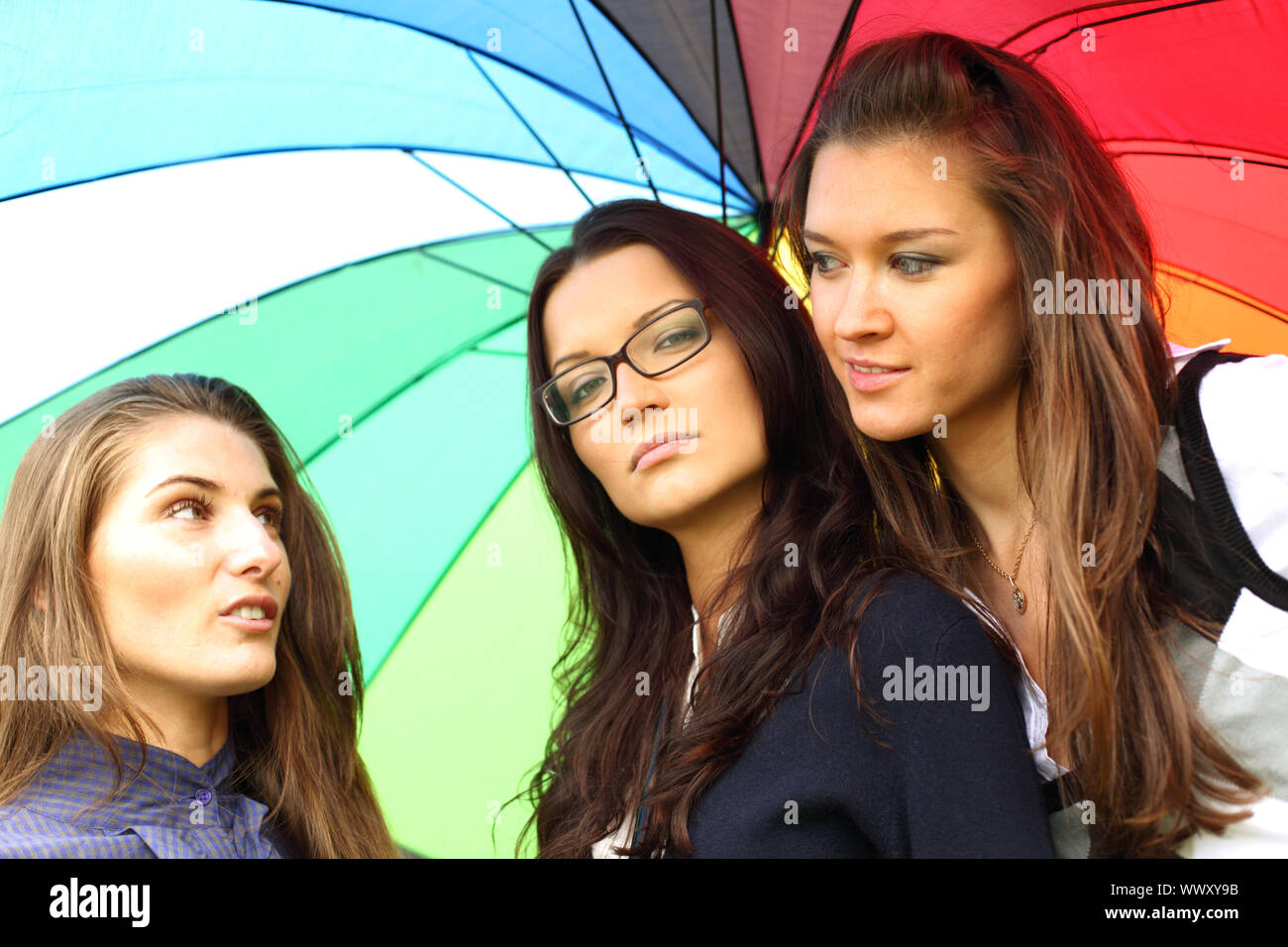 Smiley girl umbrella hi-res stock photography and images - Alamy