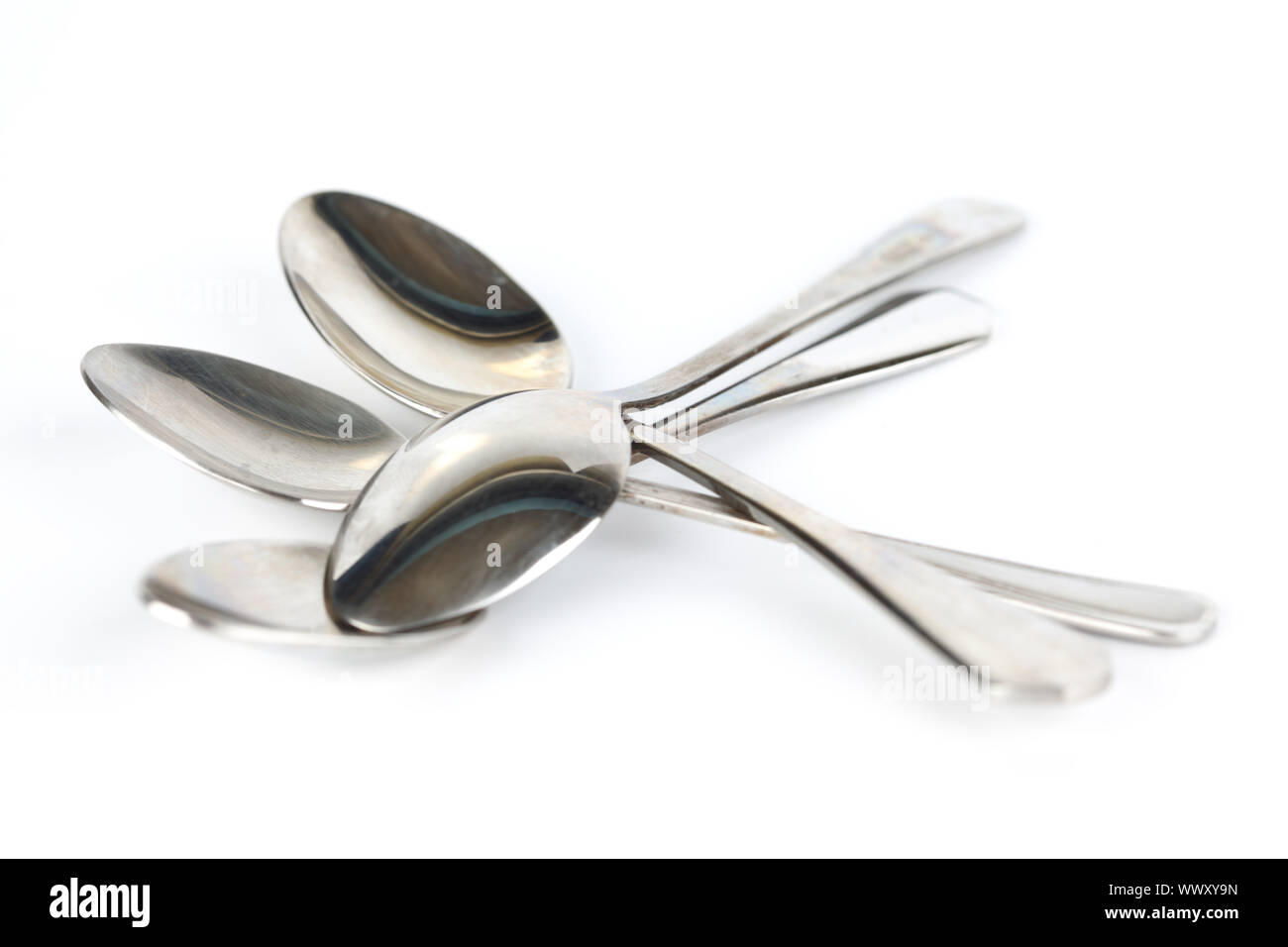 a lot of spoons isolated on white Stock Photo - Alamy