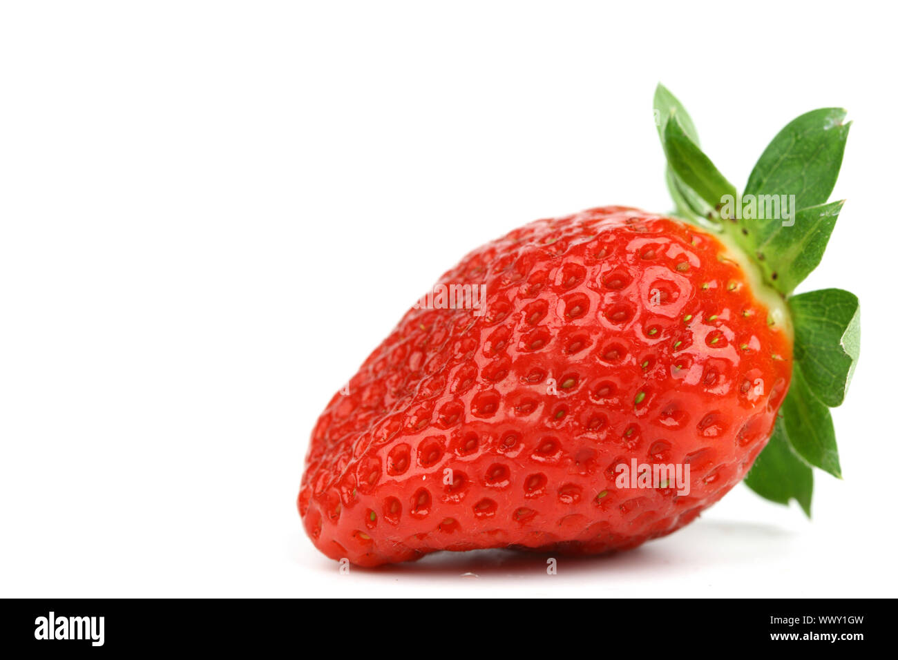 one strawberry isolated on white Stock Photo - Alamy