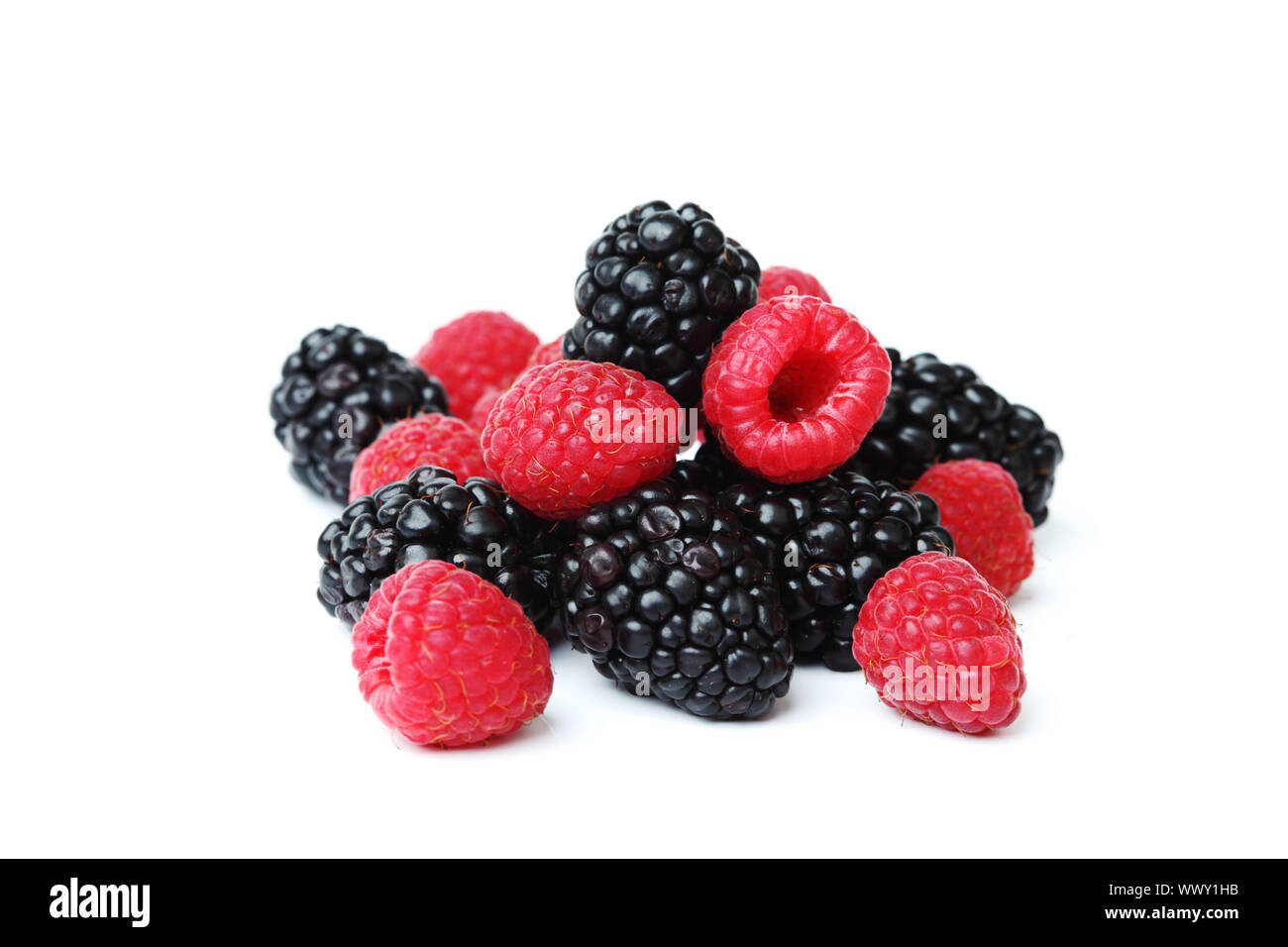berry mixed pile on black background Stock Photo - Alamy