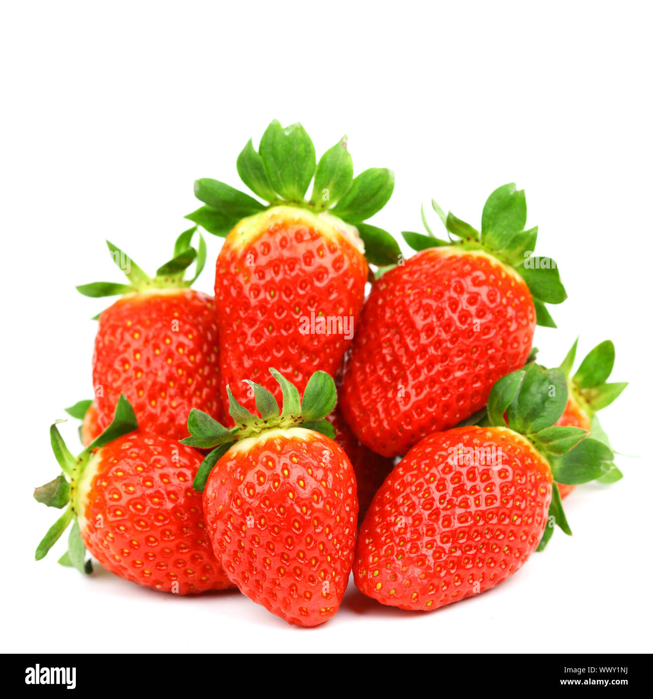 strawberry pile isolated on white background Stock Photo - Alamy