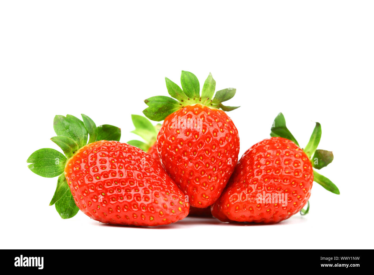 strawberry pile isolated on white background Stock Photo - Alamy