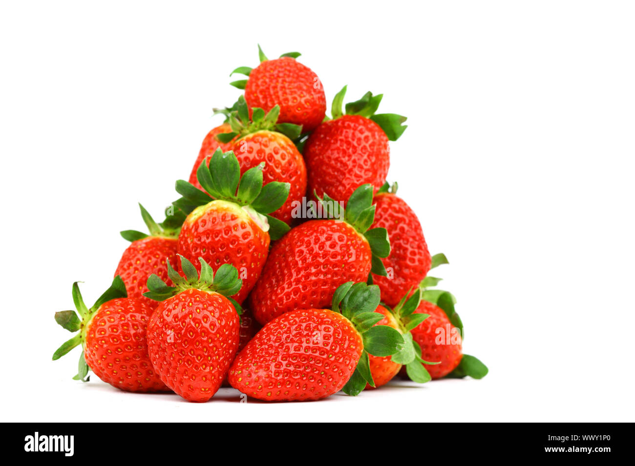 strawberry pile isolated on white background Stock Photo - Alamy