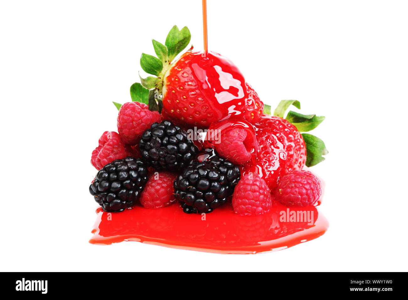 big berry pile in syrup isolated on white Stock Photo - Alamy