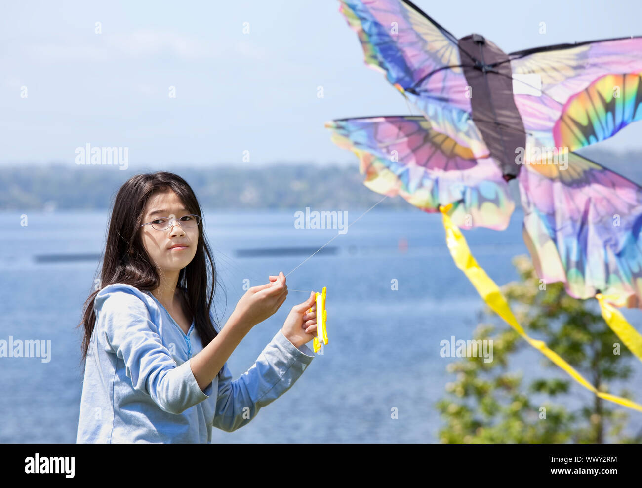 Asian girl flying kite hi-res stock photography and images - Alamy