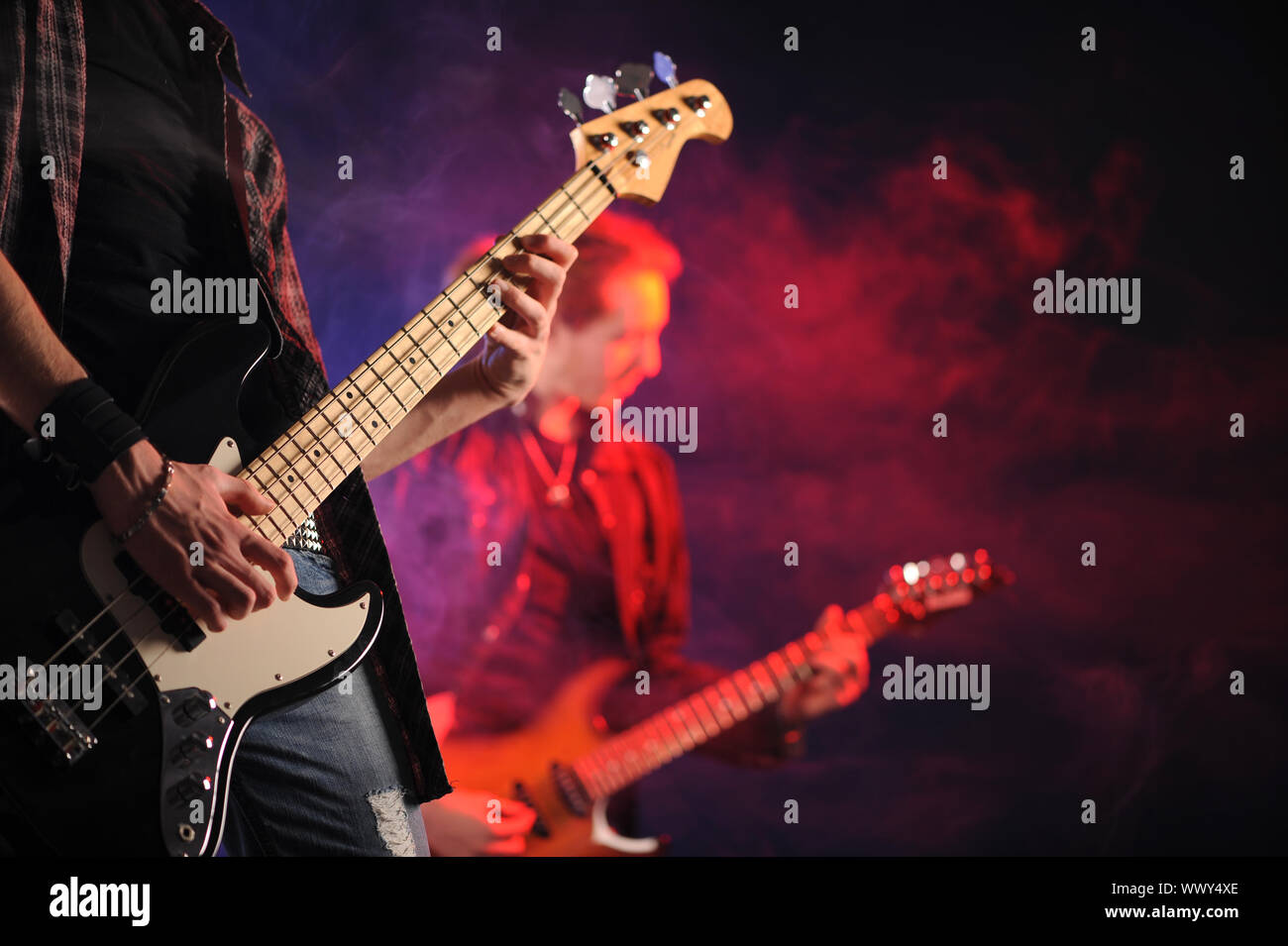 rock musicians playing at a live concert Stock Photo - Alamy