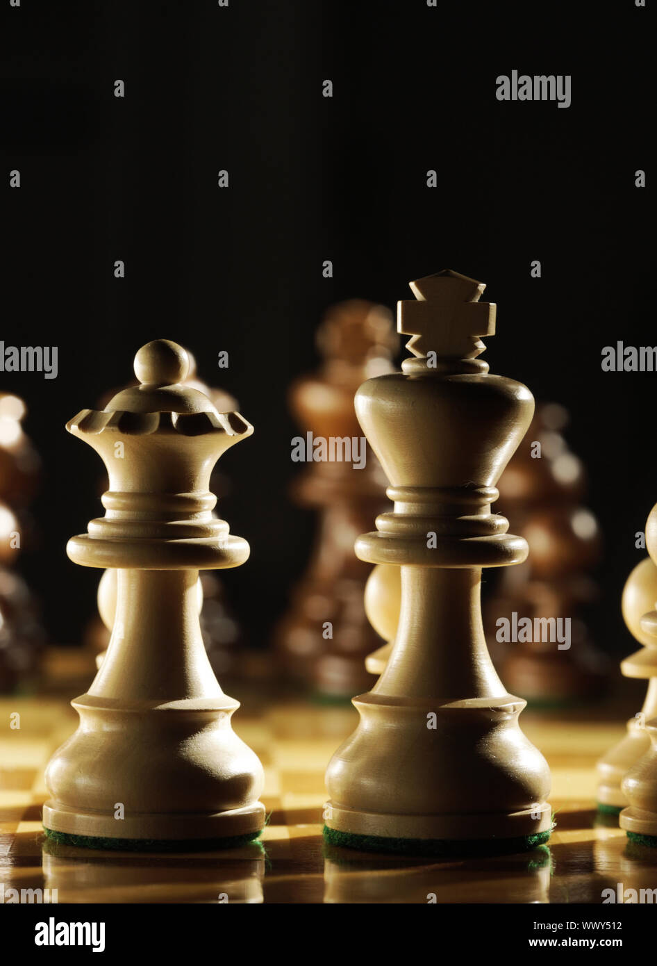 View from behind the white king and queen on a chess board Stock Photo ...