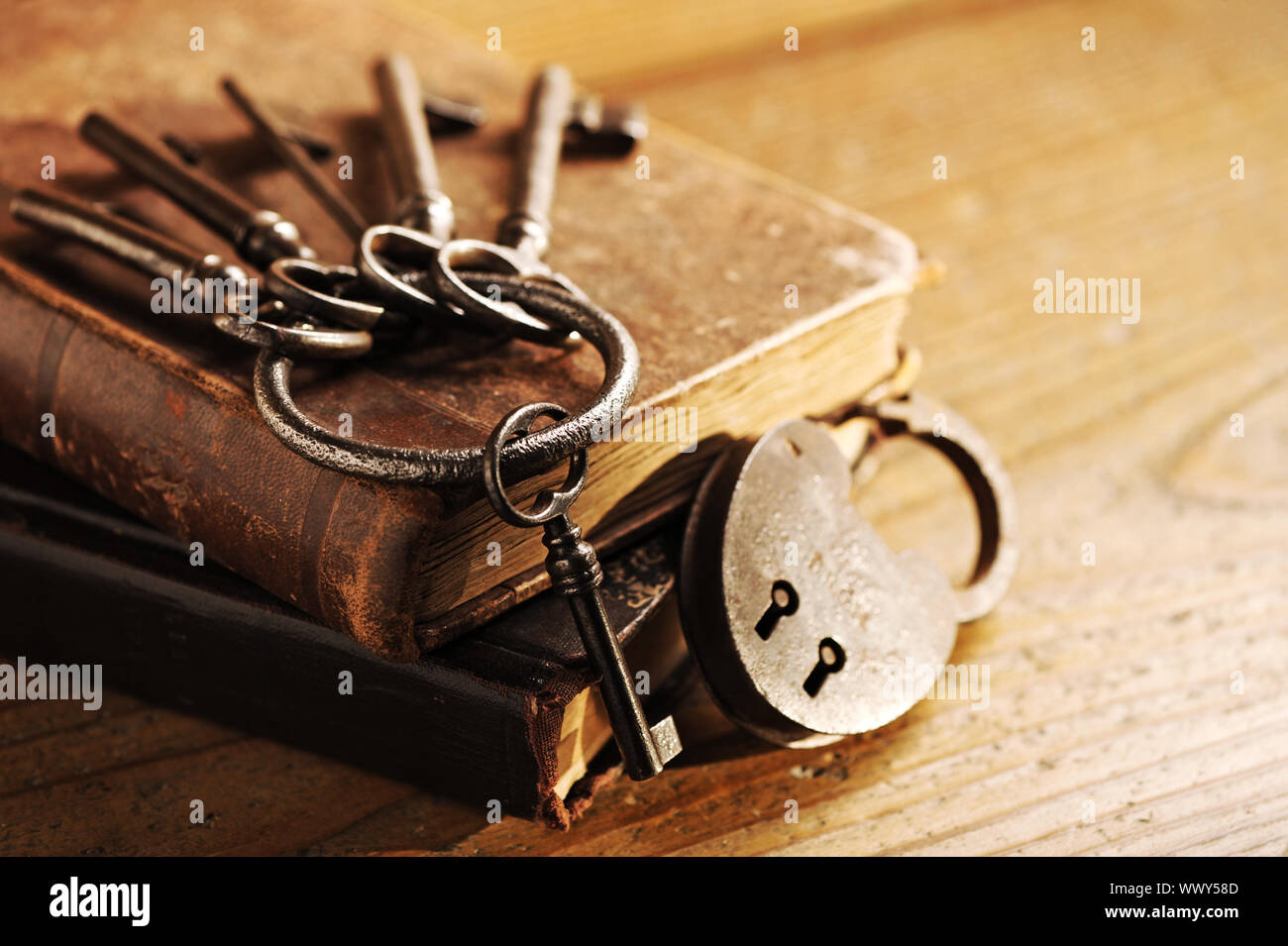 old keys on a old book, antique wood background Stock Photo - Alamy