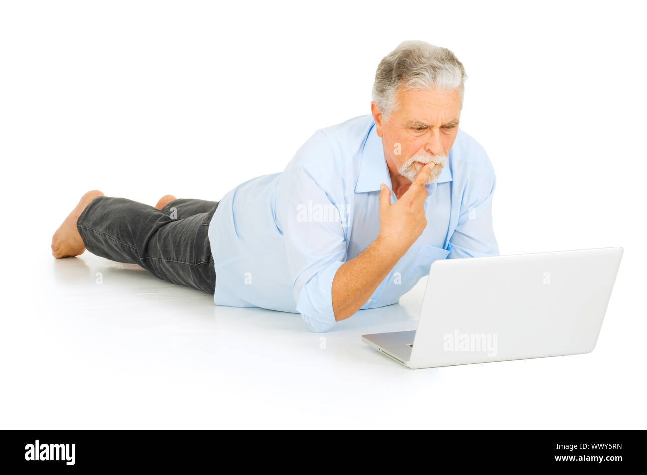 elderly man using laptop Stock Photo - Alamy