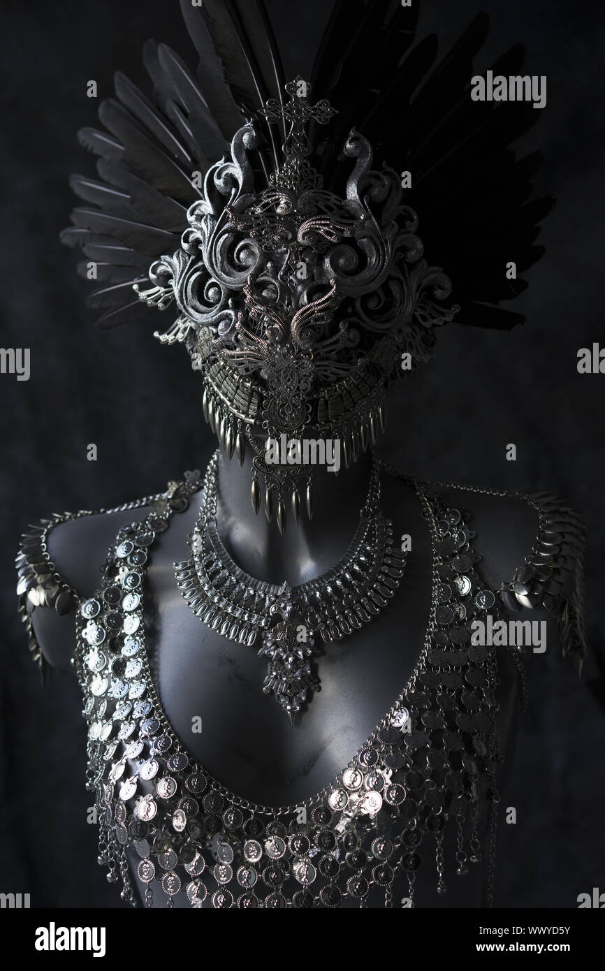 handmade piece, silver jewelry costume with chains and coins. wears a ...