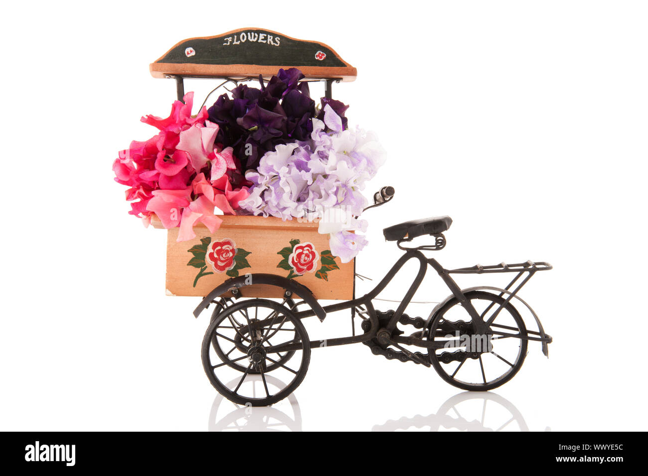 Antique miniature flower bike with colorful Lathyrus Stock Photo - Alamy