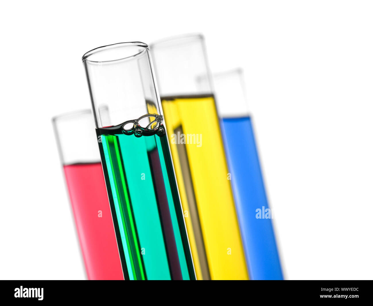 Four test tubes filled with colored liquids. Isolated on white Stock ...