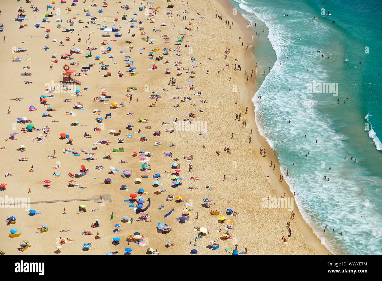 Bird's-eye view on Nazare beach riviera on the coast of Atlantic ocean ...