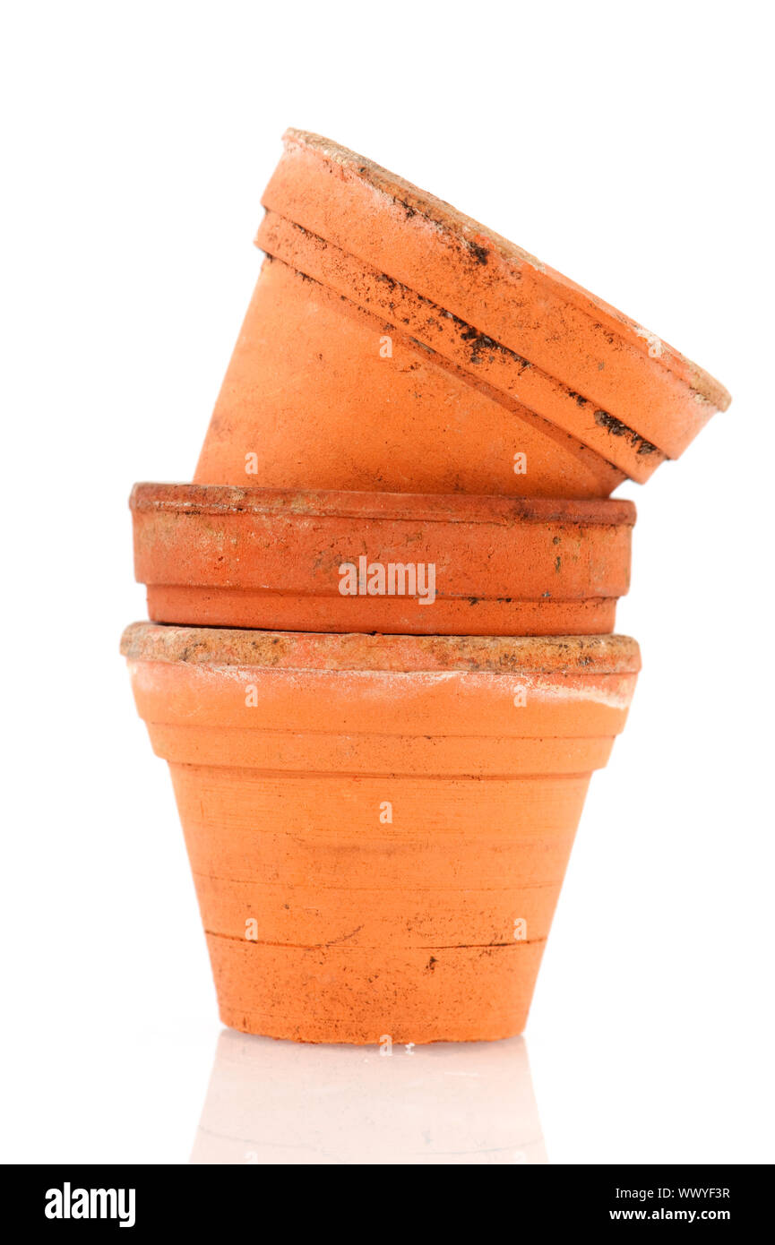used stone flower pots for the garden Stock Photo - Alamy