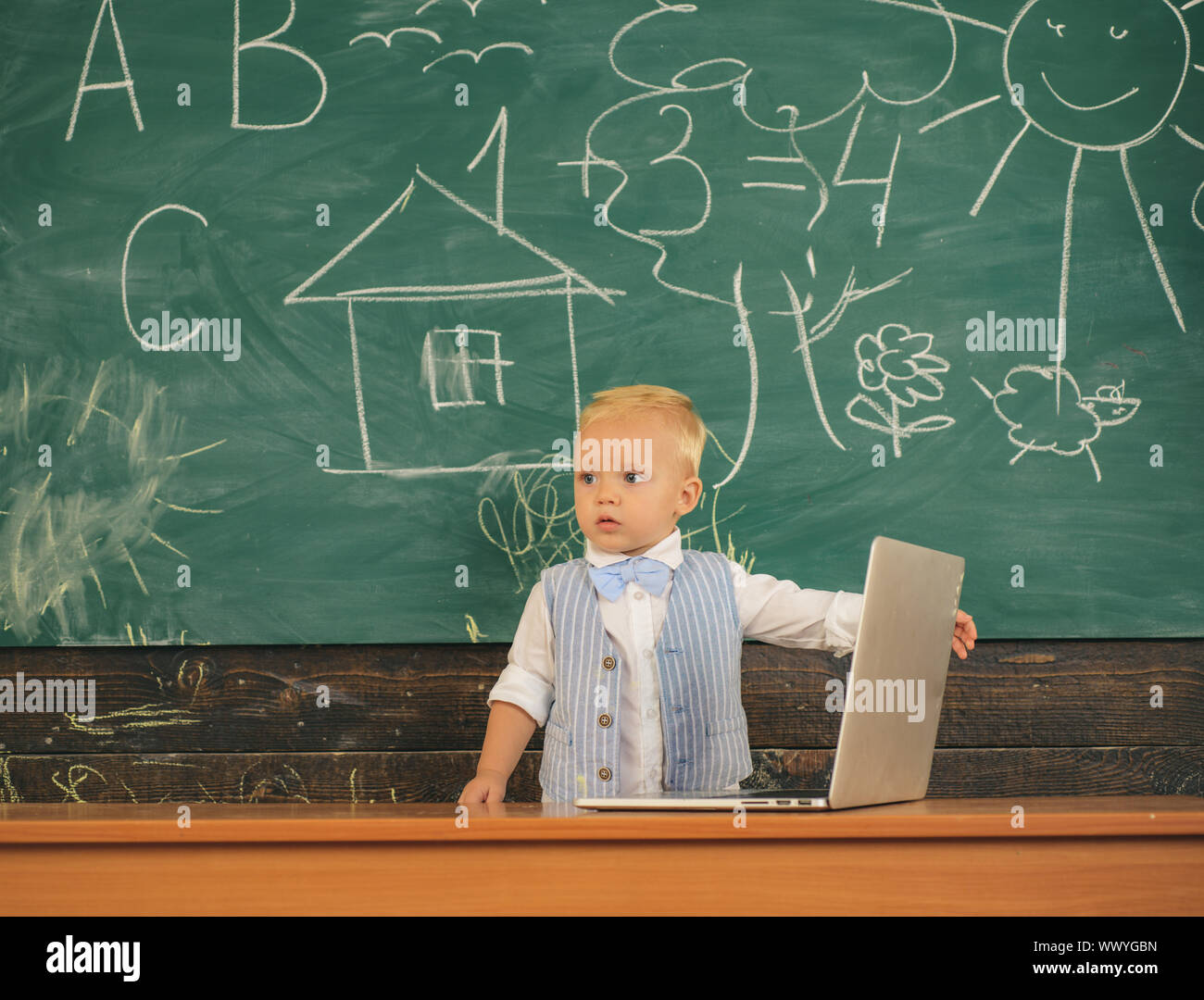 Child programming on laptop in computer class. Developing programming ...