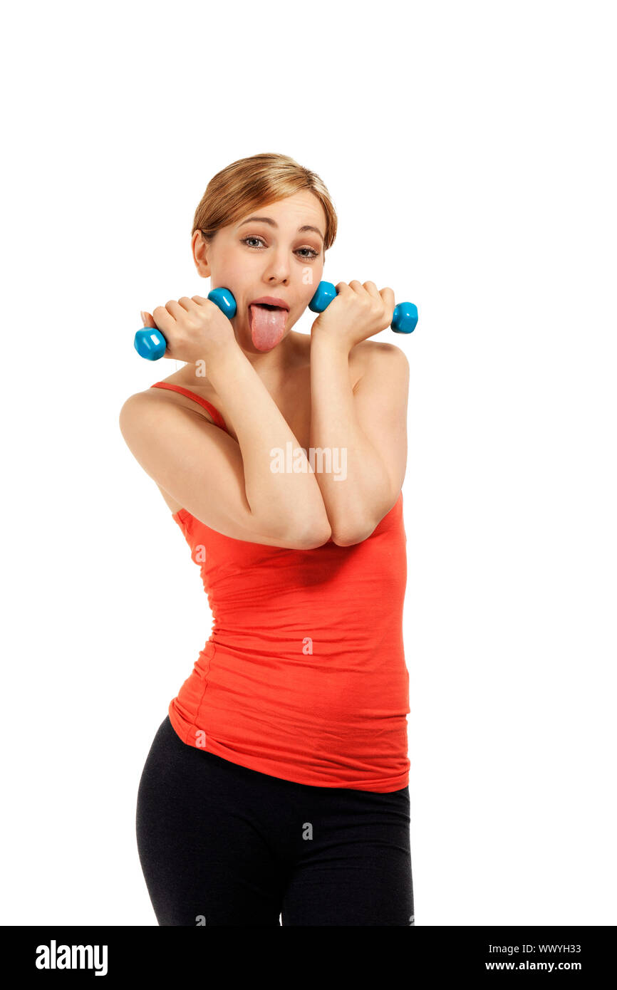 funny young fitness woman with dumbbells on white background Stock ...