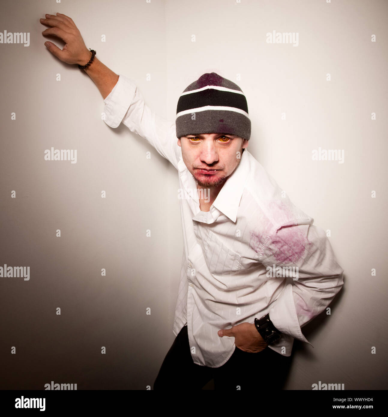 Male zombie or vampire hanging out in a corner Stock Photo - Alamy