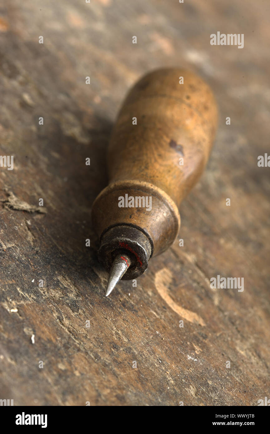 old awl of the carpenter Stock Photo - Alamy