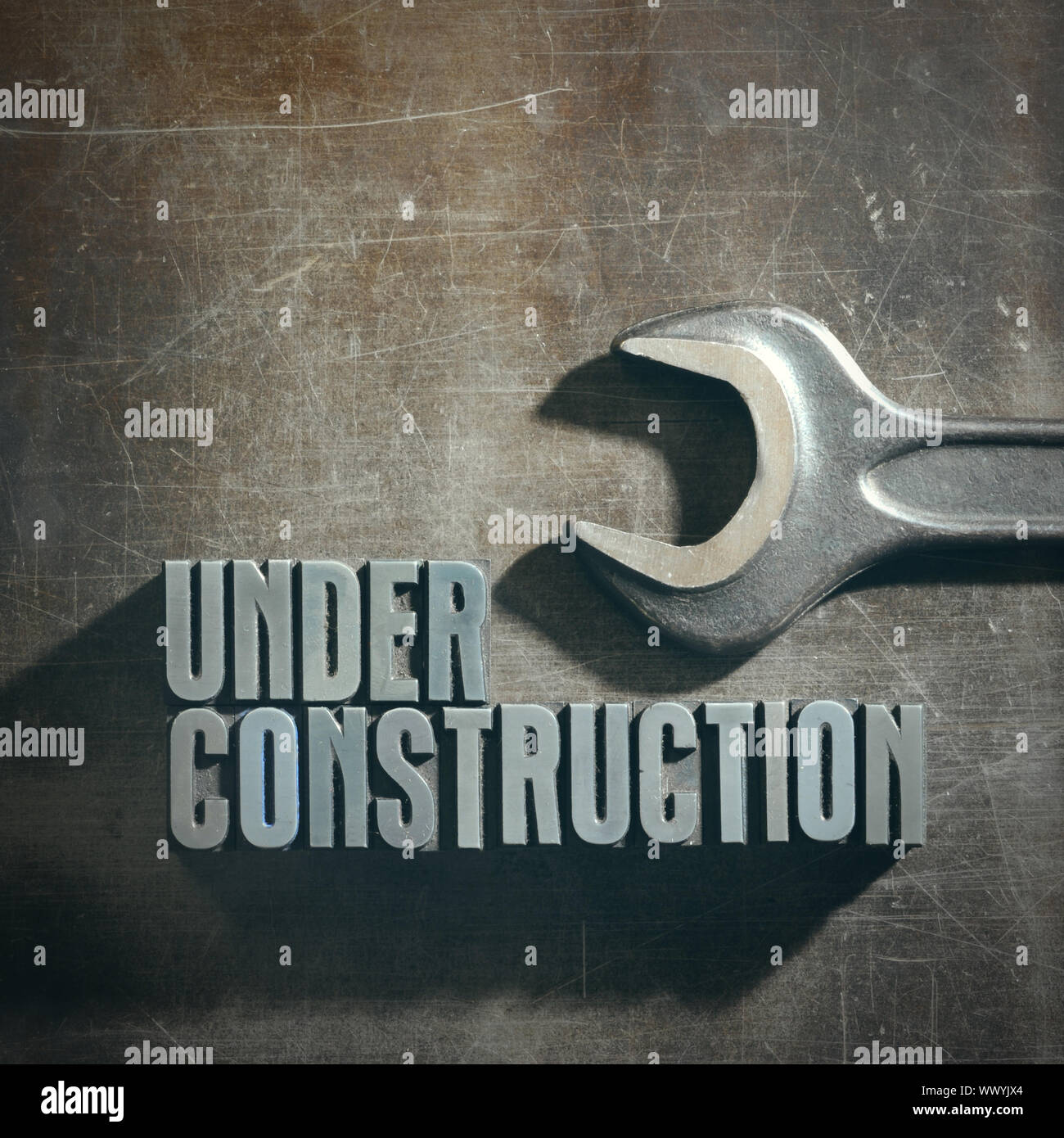 Under Construction sign with a metallic background texture Stock Photo ...