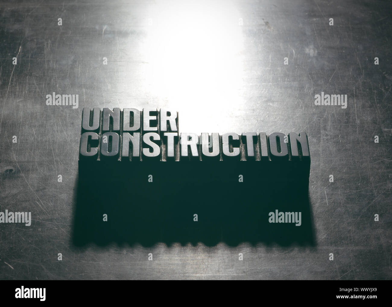 Under Construction sign with a metallic background texture Stock Photo ...
