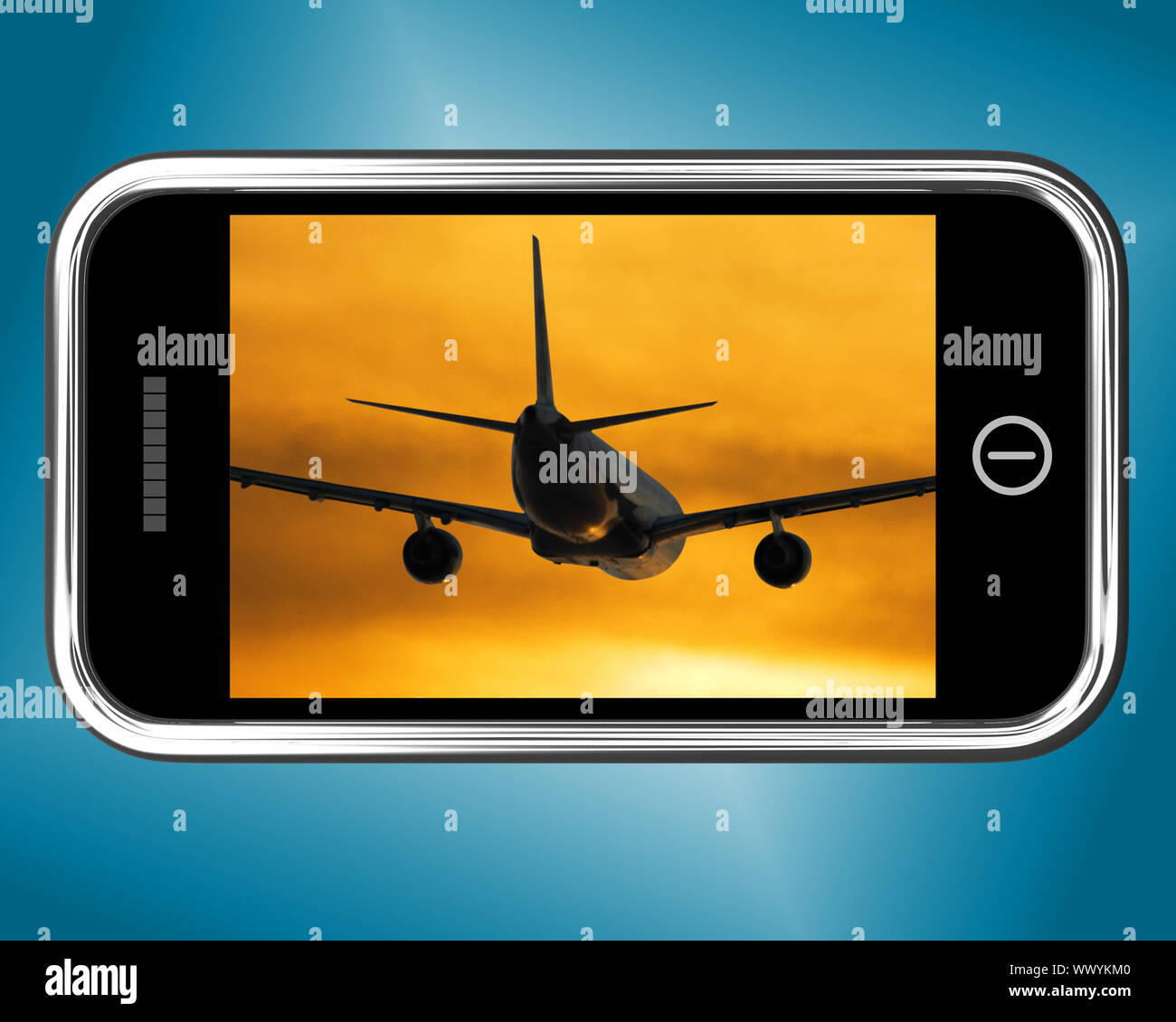 Airplane Flying Towards The Sunset On A Mobile Phone Stock Photo - Alamy