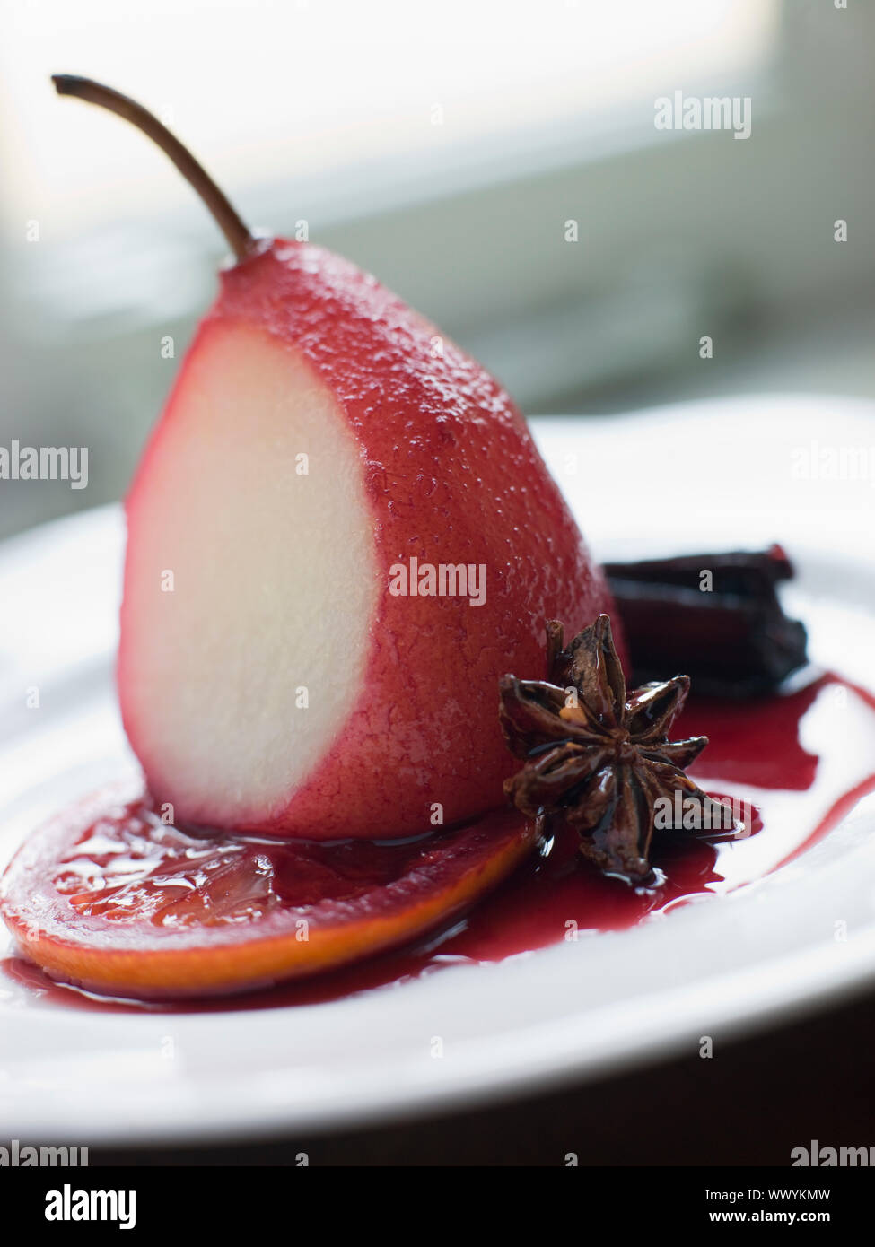 Pear Poached in Rioja Orange and Spices Stock Photo - Alamy