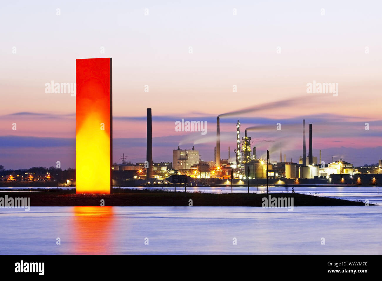 illuminated sculpture Rhine Orange in front of industrial scenery ...