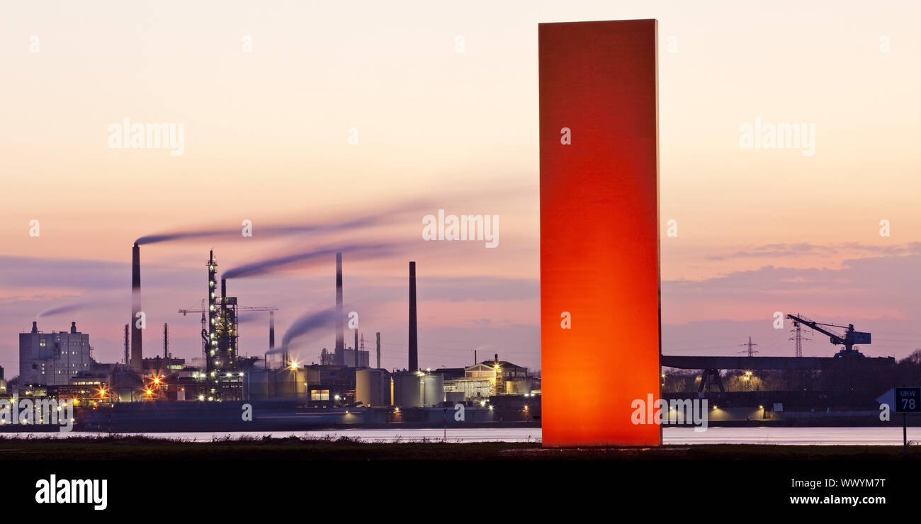 illuminated sculpture Rhine Orange in front of industrial scenery ...