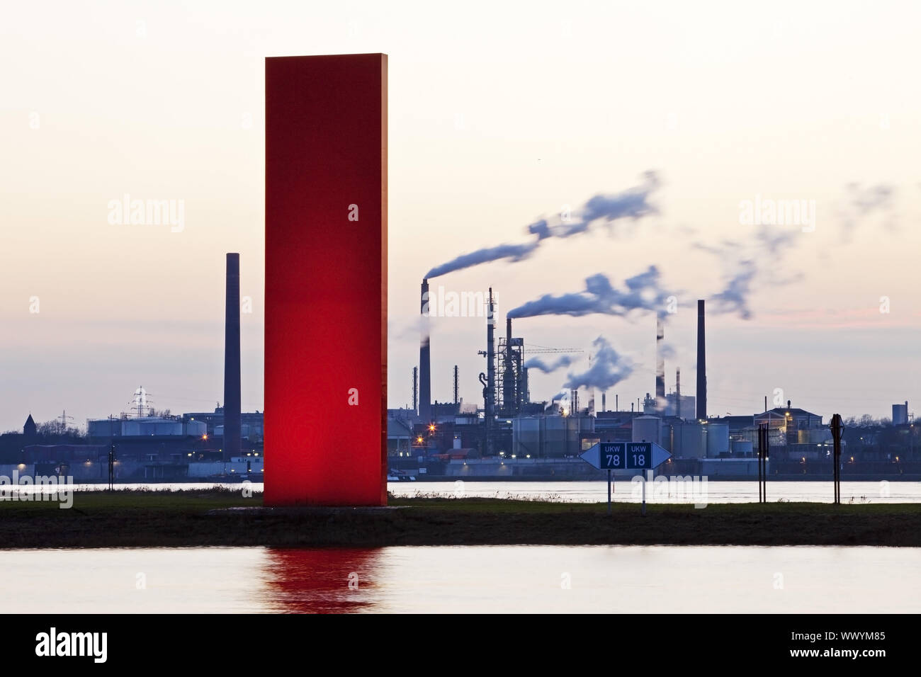illuminated sculpture Rhine Orange in front of industrial scenery ...