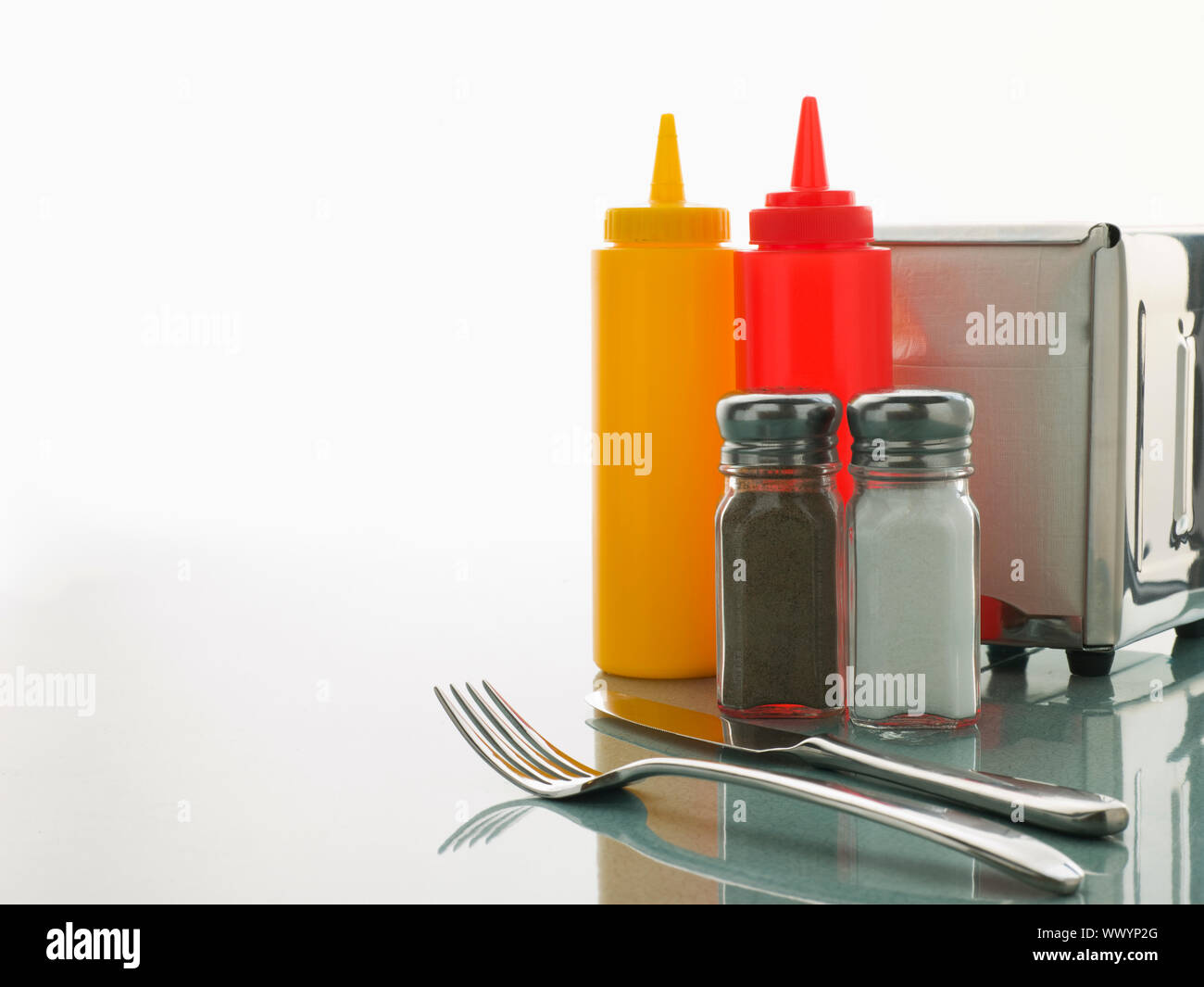 Diner Table with Sweet Condiments Stock Photo - Alamy