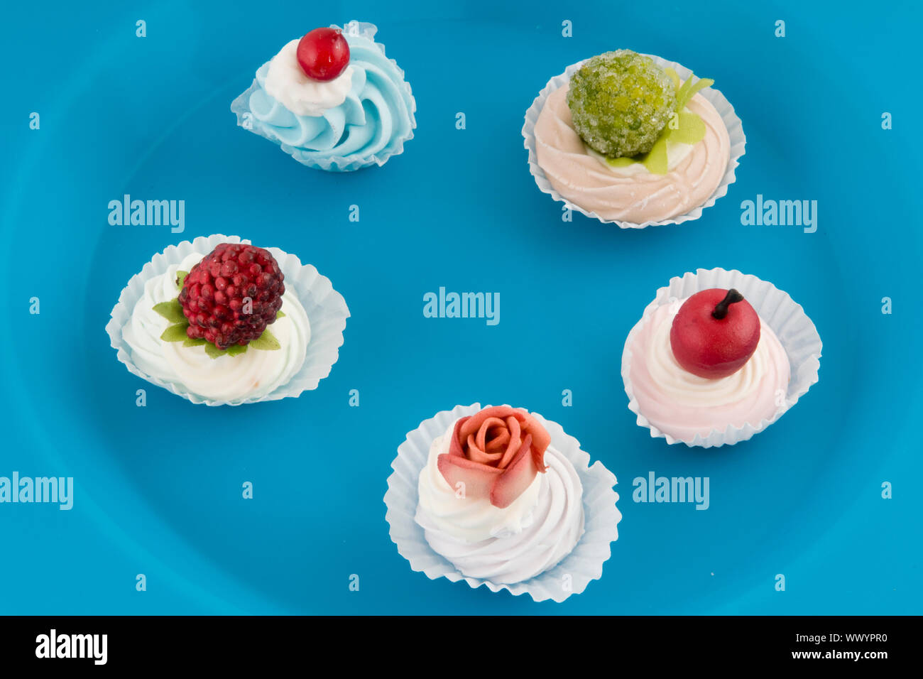 Fancy little cakes with whipped cream Stock Photo - Alamy
