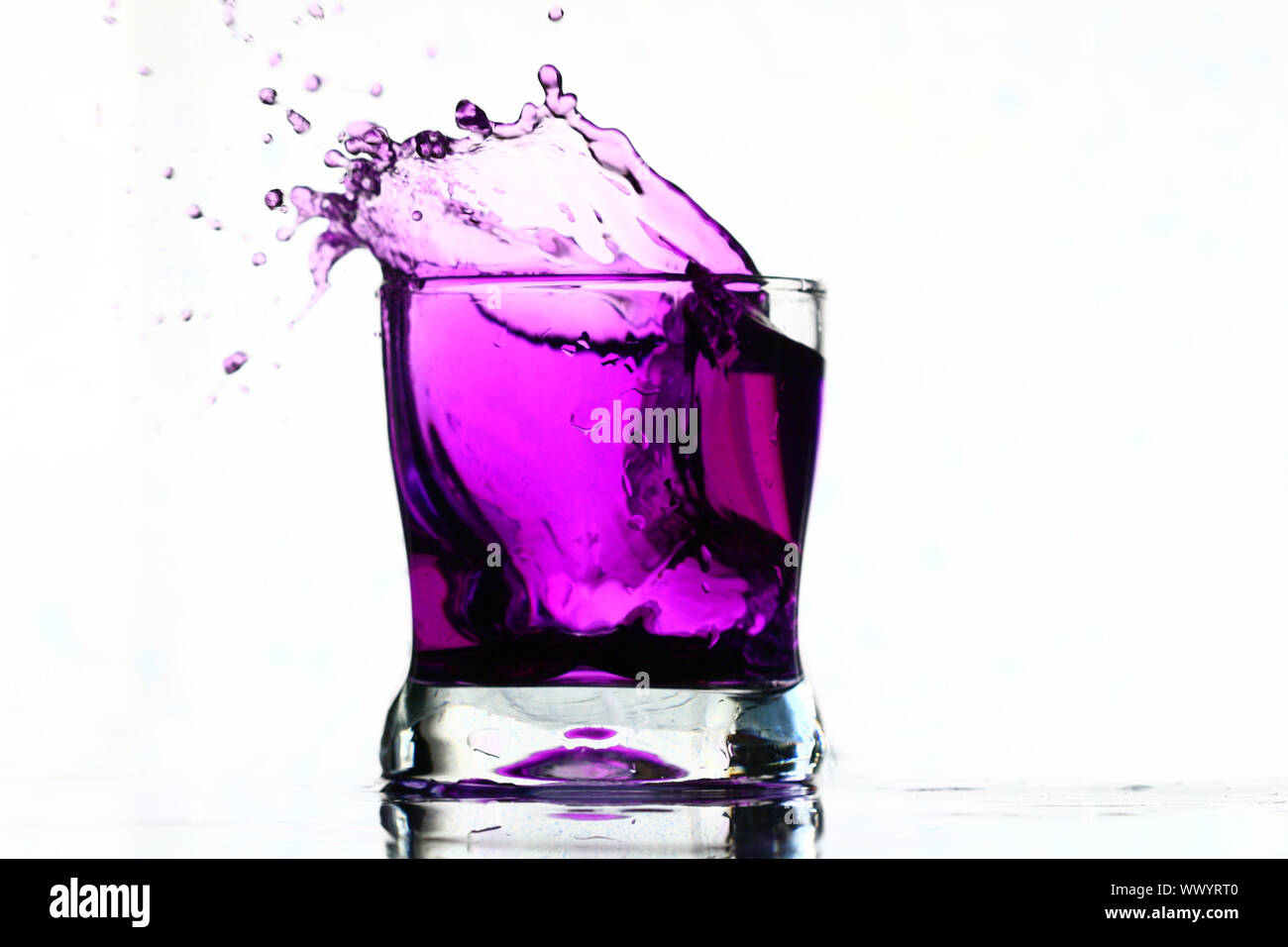 coctail drink splash isolated on white Stock Photo - Alamy
