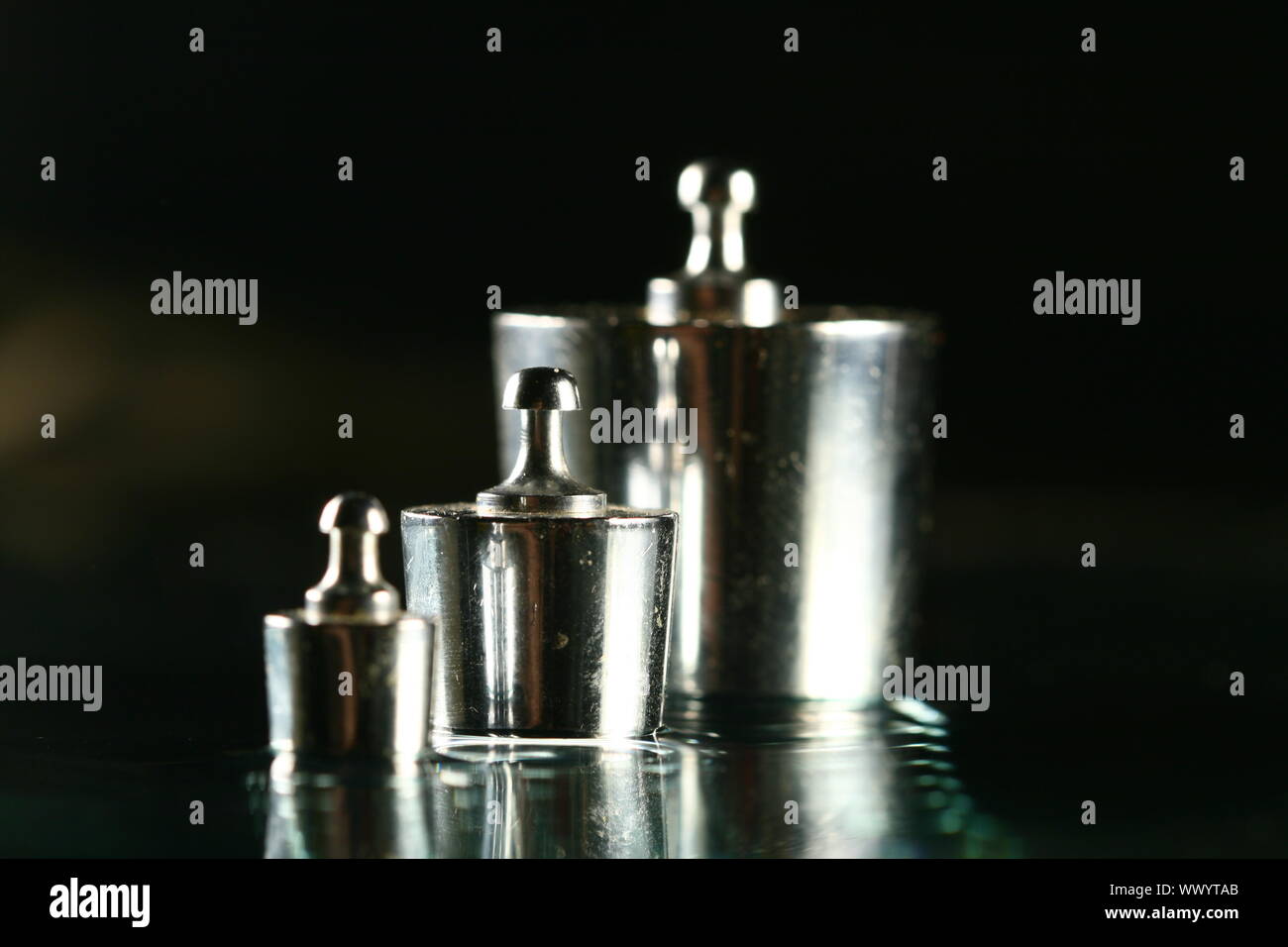Weights calibration standard science background Stock Photo - Alamy